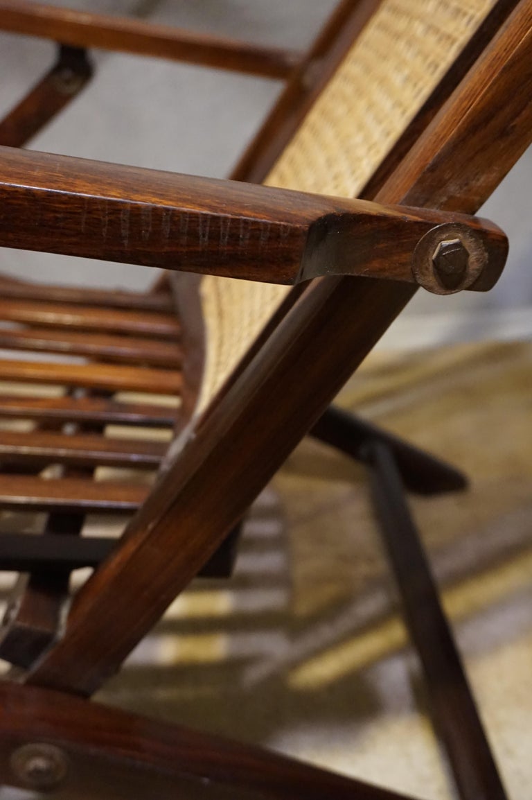 British Colonial Folding Campaign Chair with Cane Work and Bolts at 1stDibs