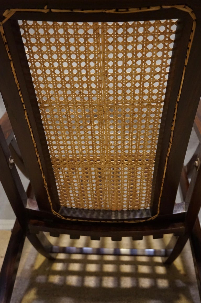 British Colonial Folding Campaign Chair with Cane Work and Bolts at 1stDibs