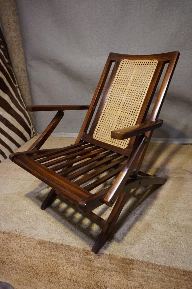 British Colonial Folding Campaign Chair with Cane Work and Bolts at 1stDibs