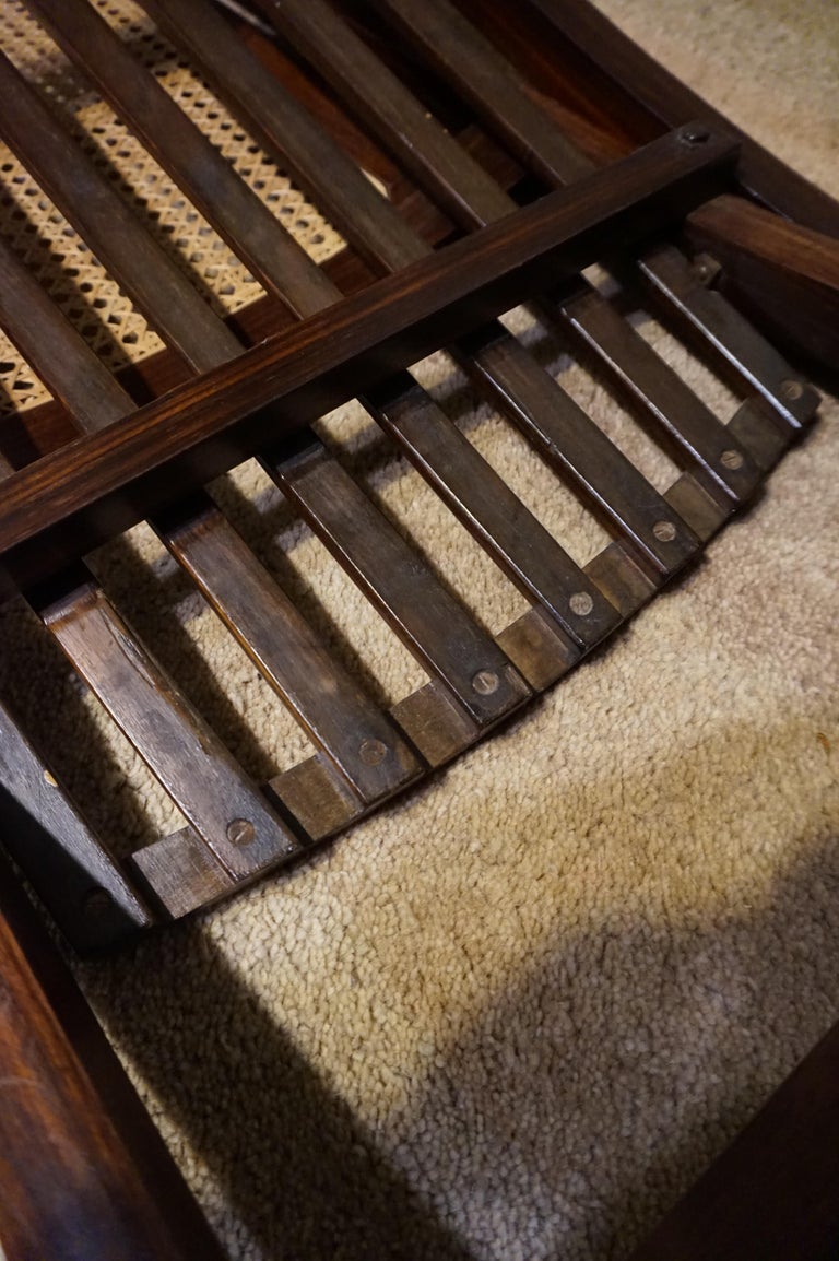 British Colonial Folding Campaign Chair with Cane Work and Bolts at 1stDibs