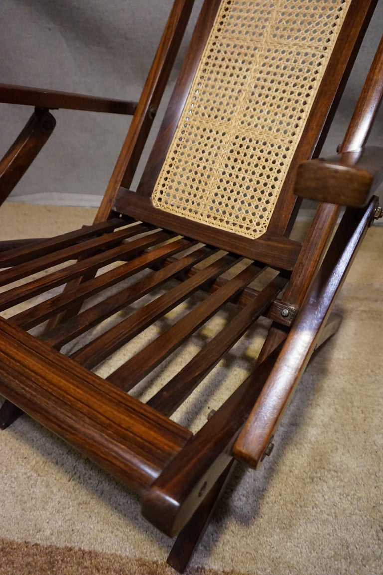 British Colonial Folding Campaign Chair with Cane Work and Bolts at 1stDibs