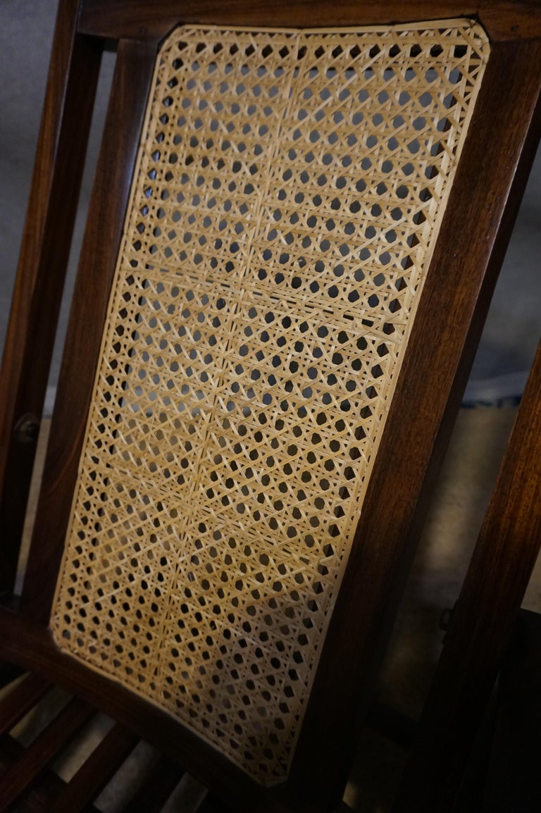 British Colonial Folding Campaign Chair with Cane Work and Bolts at 1stDibs