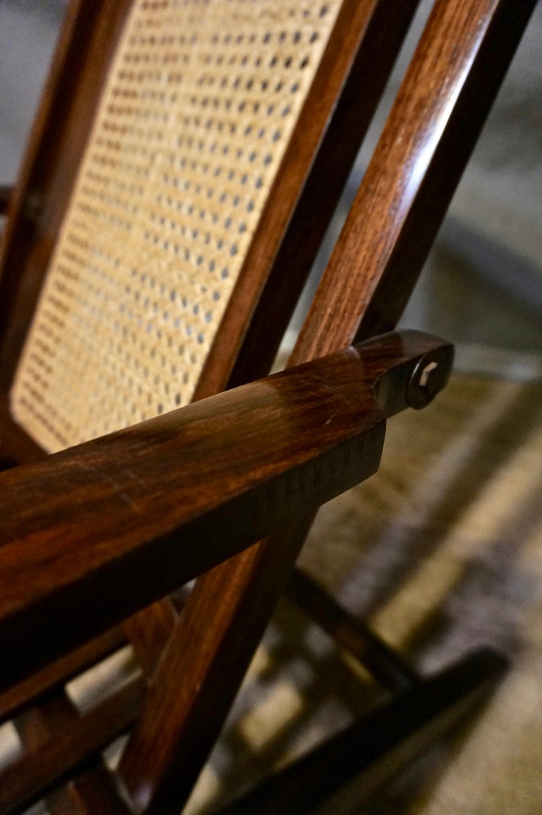 British Colonial Folding Campaign Chair with Cane Work and Bolts at 1stDibs