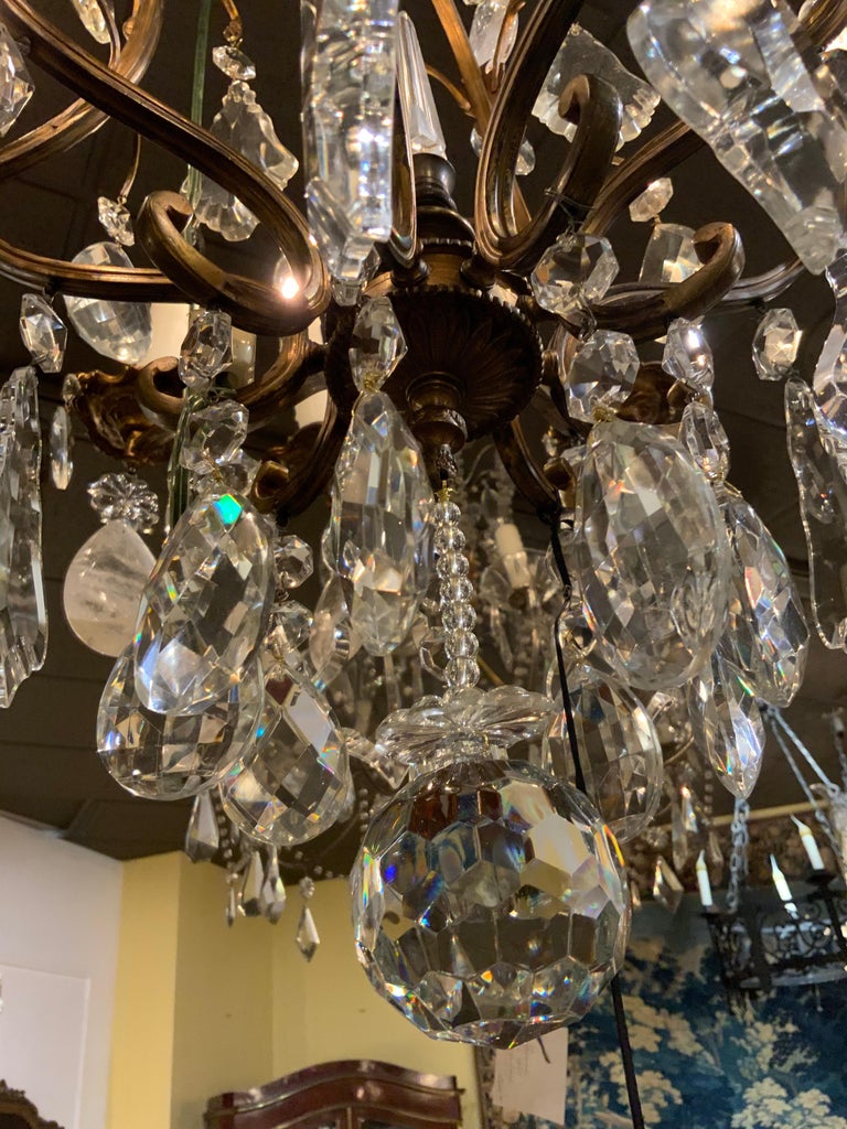 Bronze and Crystal Nine Light Chandelier with Scrolling Arms and Rock ...