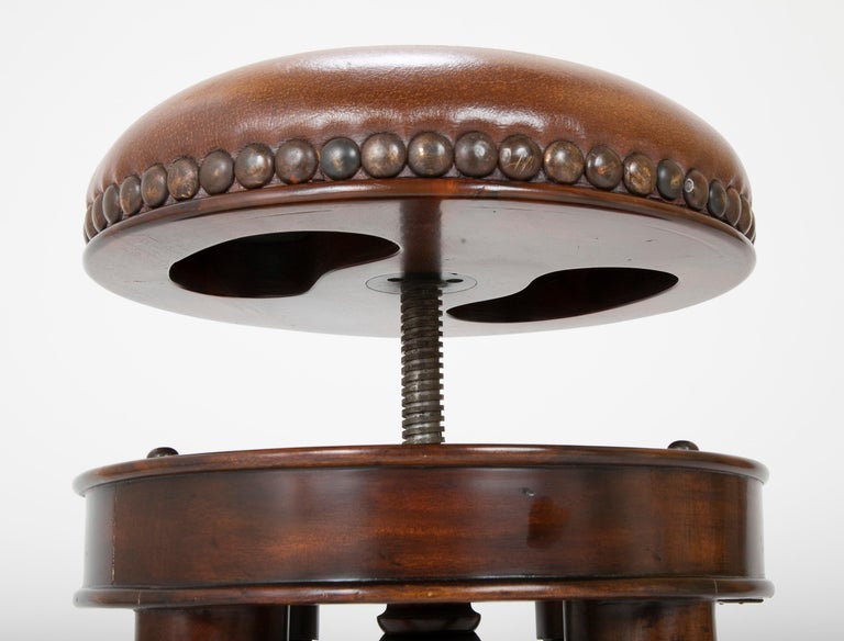 Bronze Four Legged Adjustable Revolving Stool with Leather Upholstered ...