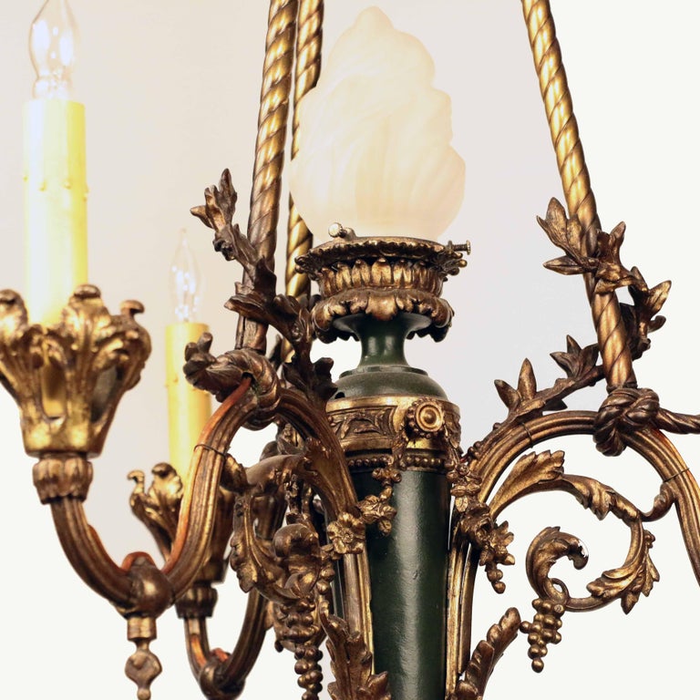 Bronze Gasolier Modeled with a Central Flambeau Shade at 1stDibs