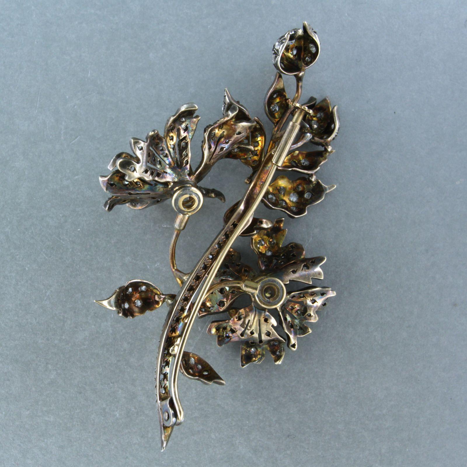 Brooch in a shhape of a branch set with diamond 18k gold and silver For ...