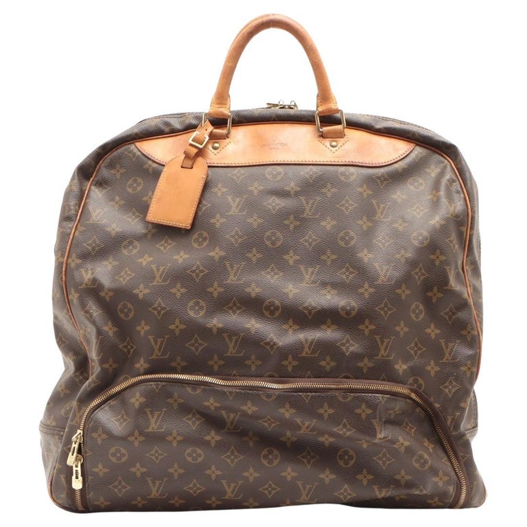 Brown and tan monogram coated canvas Louis Vuitton Evasion bag with gold-tone For Sale at 1stDibs