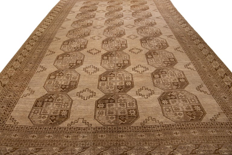 Brown Antique Turkmen Handmade Wool Rug With Gul Motif For Sale at 1stDibs