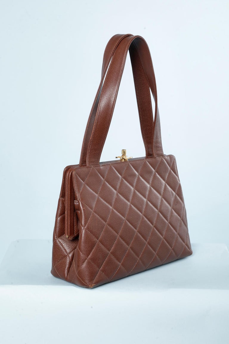 Brown leather padded bag Chanel ( numbered) at 1stDibs