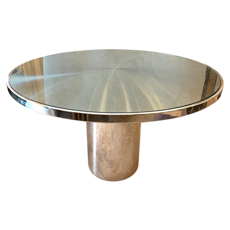 Brueton Round Stainless Steel and Glass Table at 1stDibs