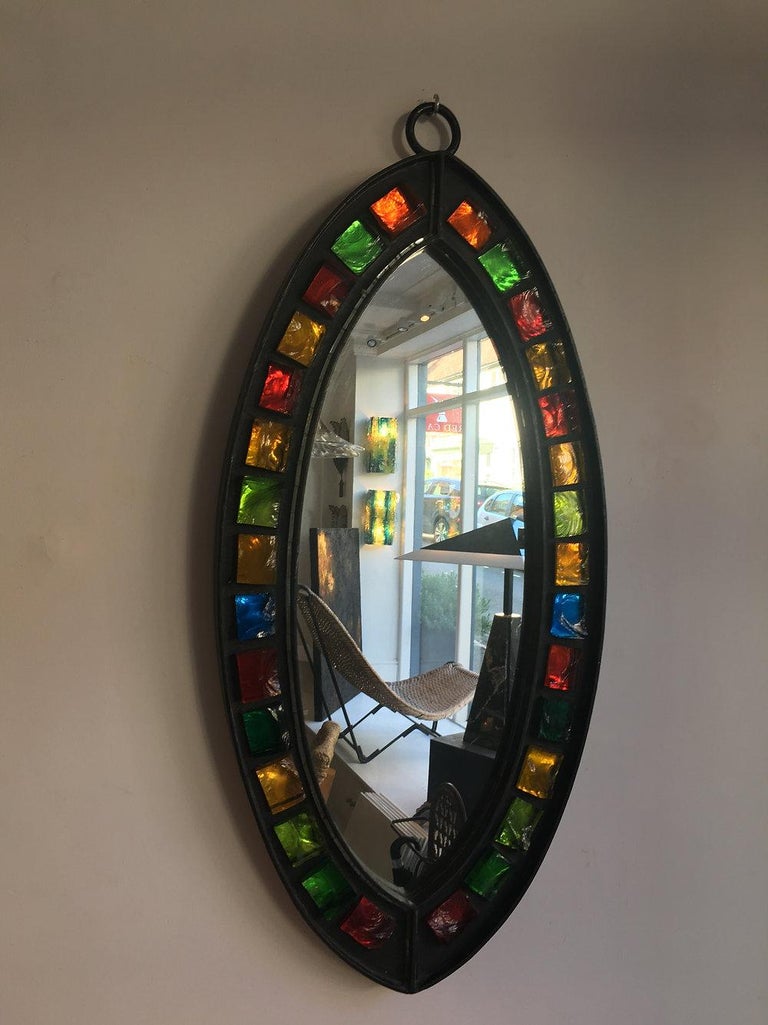 Brutalist Iron and Coloured Glass Elliptical Mirror For Sale at 1stDibs