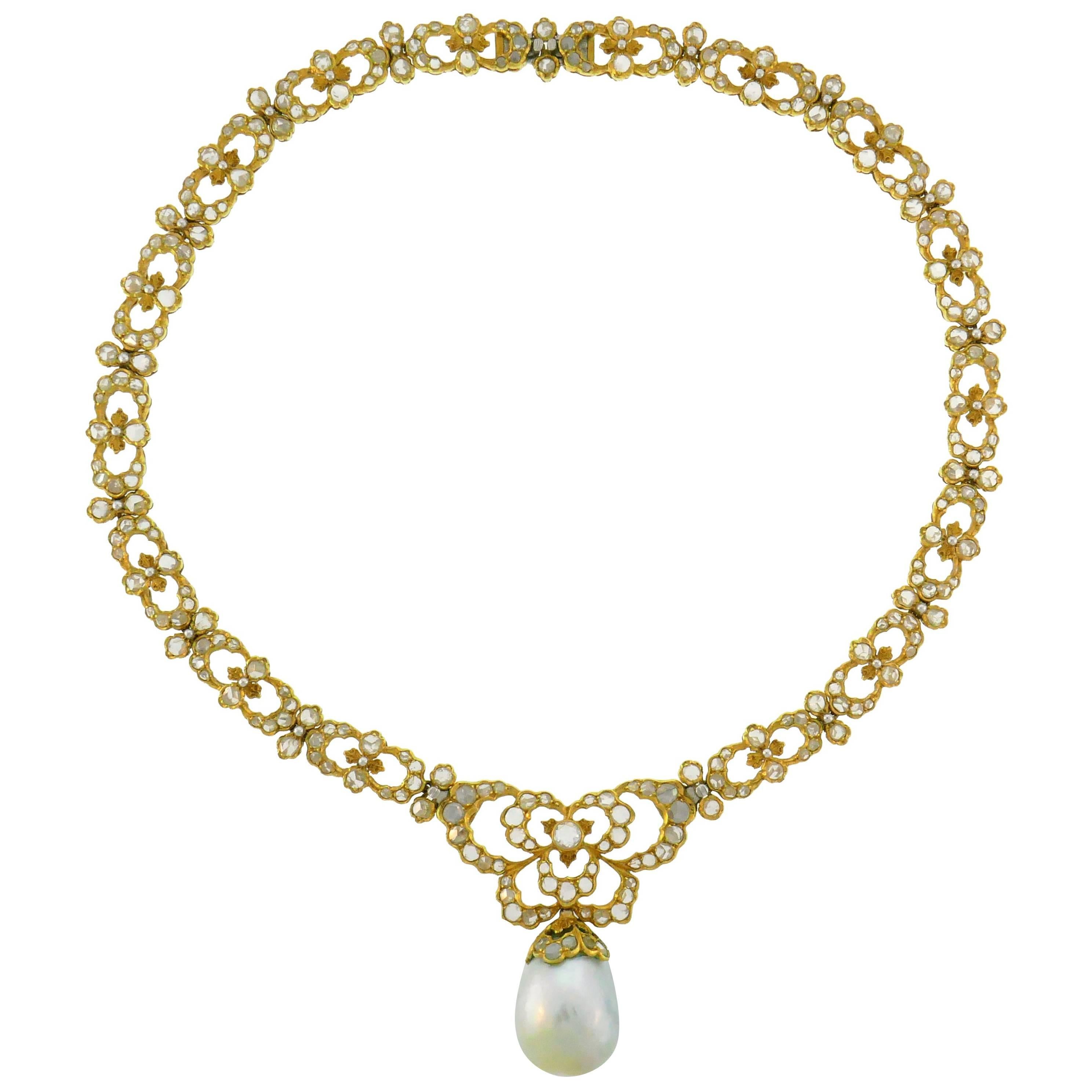 1970s Buccellati Baroque Pearl Diamond Emerald and Gold Necklace at 1stDibs