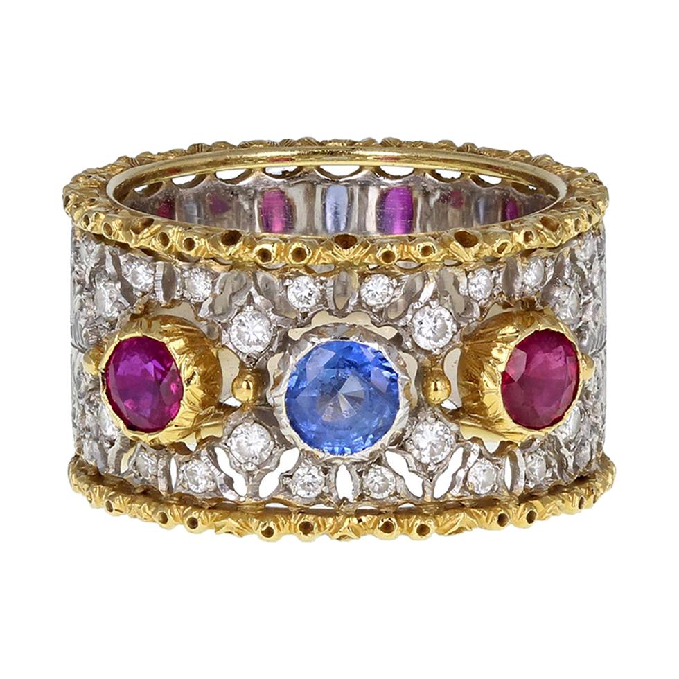 Two colors of gold Buccellati ring set with a sapphire and diamonds. at ...
