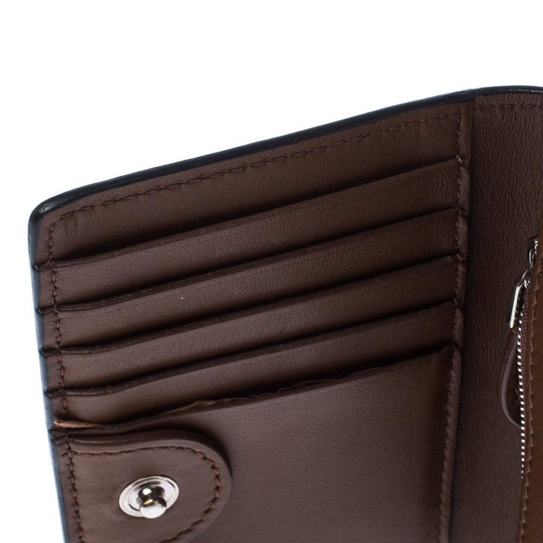 Burberry Navy Blue Embossed Crest Leather Bifold Wallet For Sale at 1stDibs