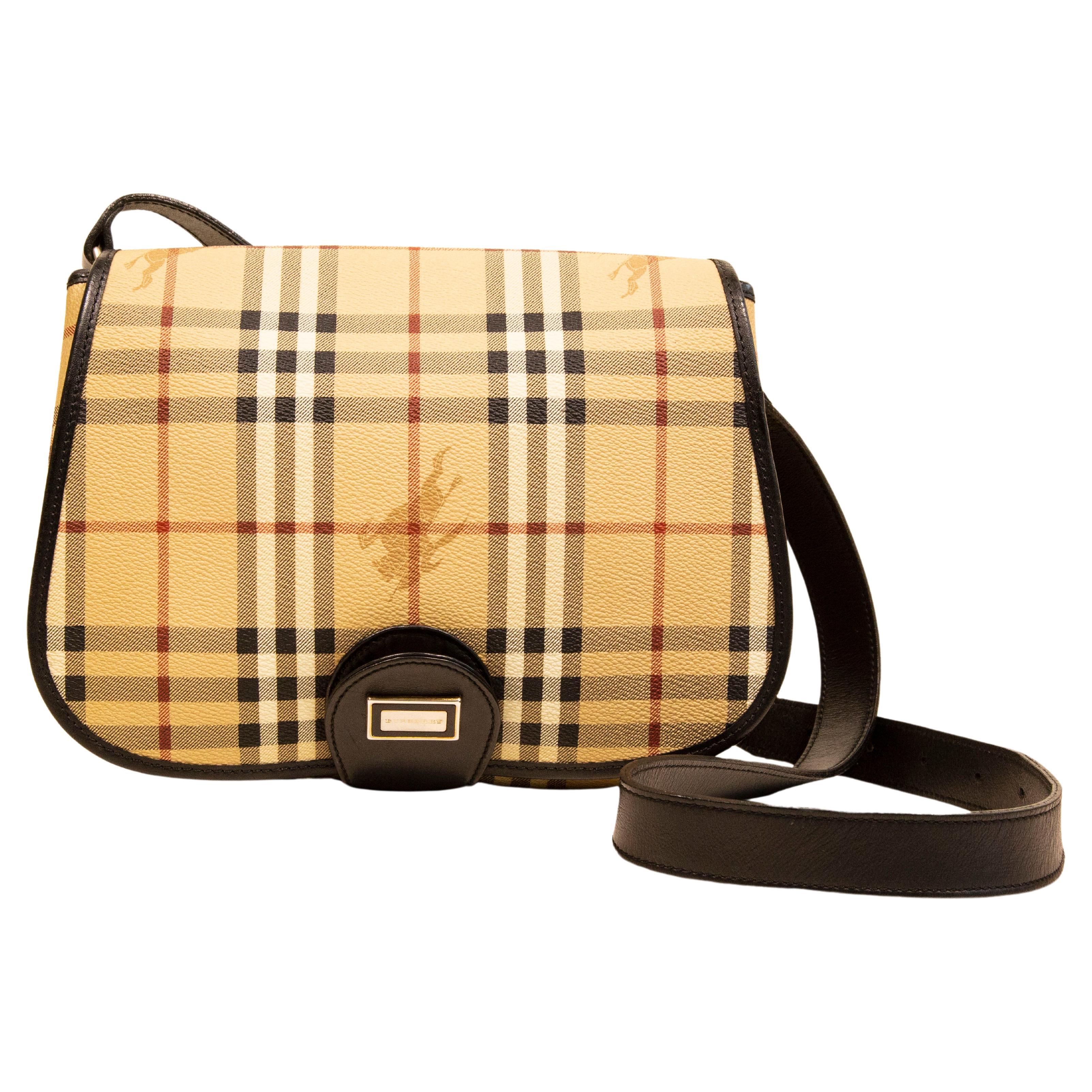 Burberry Saddle Bag in Vinyl Coated Canvas with the Burberry Classic ...