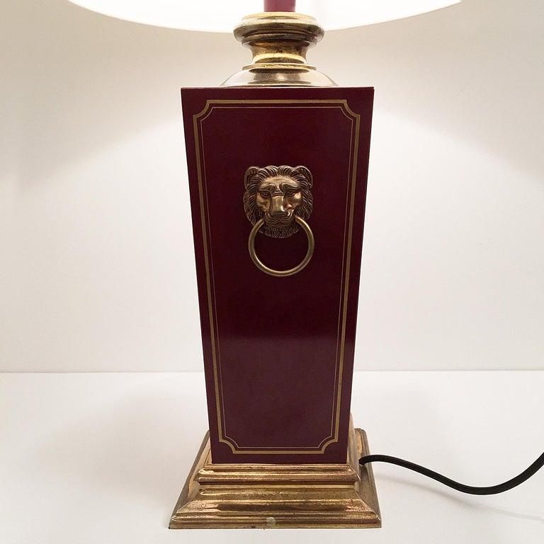 Burgundy Bakelite and Brass Lion Heads Table Lamps For Sale at 1stDibs