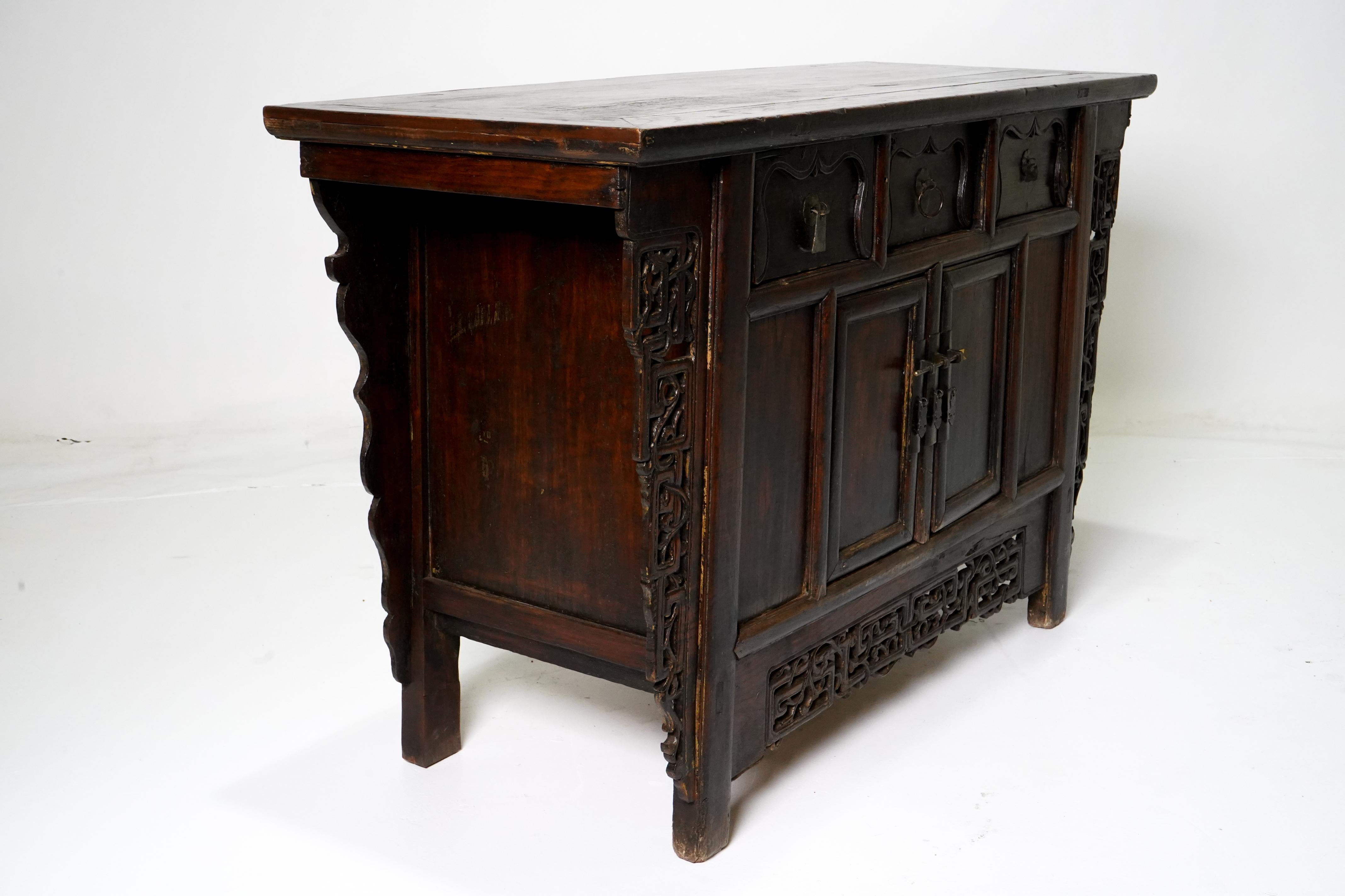 Butterfly Style Storage Cabinet with Carved Spandrels For Sale at 1stDibs
