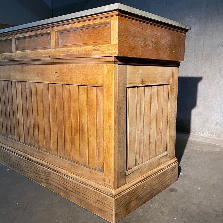 C 1900 Solid Oak /Fir Multi Panel General Store Counter at 1stDibs