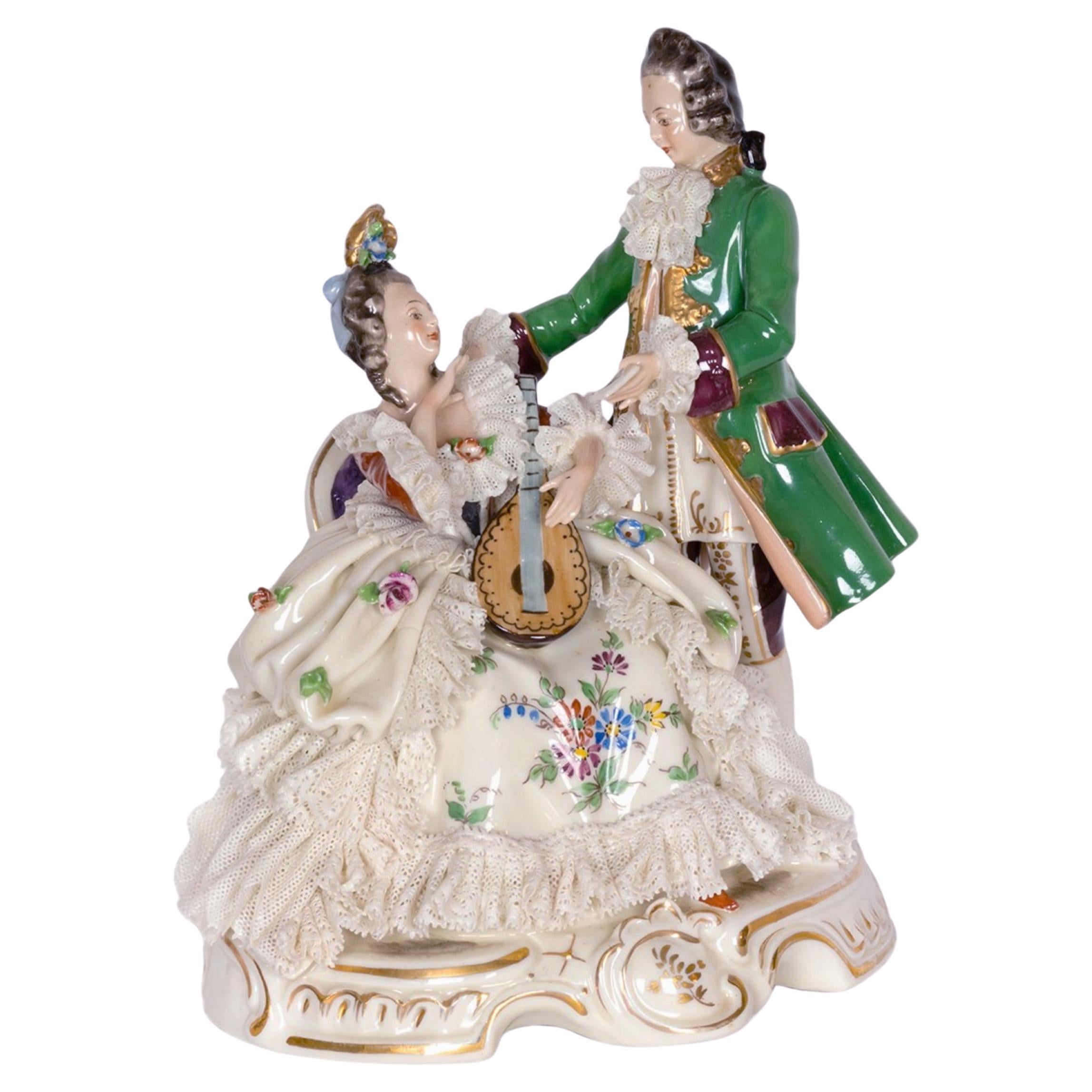 Baroque Style Couple Porcelain Statues, (20th Century) For Sale at 1stDibs