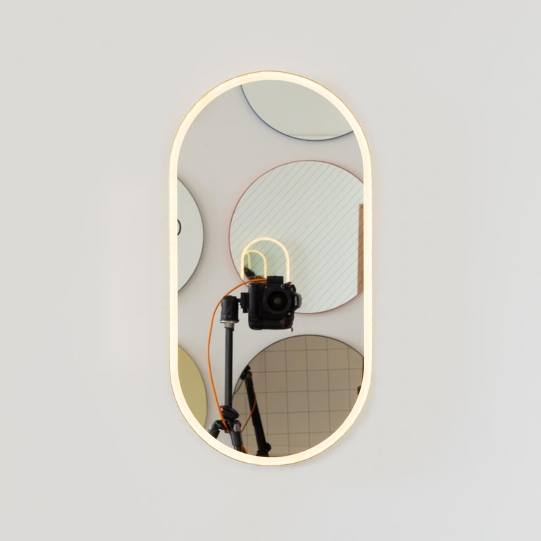 Capsula Illuminated Capsule Shaped Customisable Mirror with Brass Frame ...
