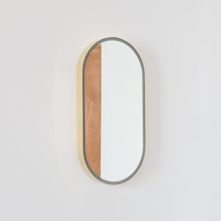 Capsula Illuminated Capsule Shaped Customisable Mirror with Brass Frame ...