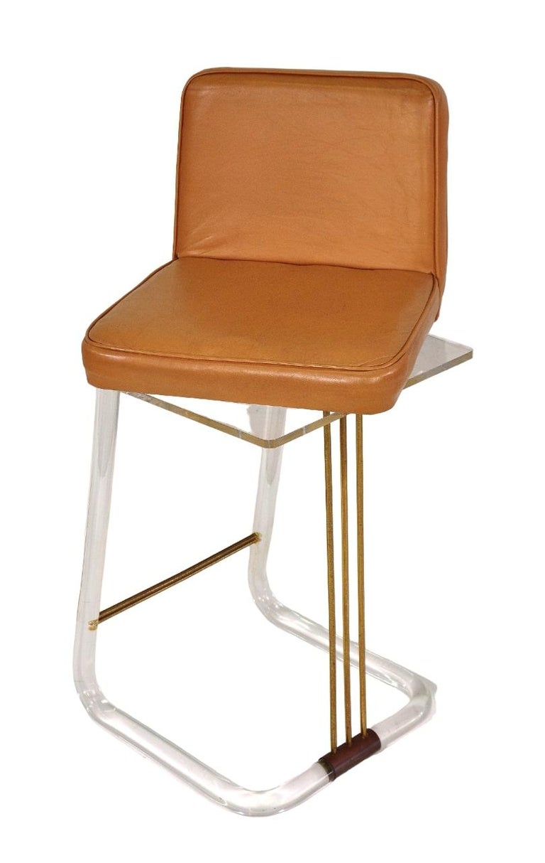 Caramel Leather and Lucite Swivel Bar Stools by Lion in Frost For Sale ...