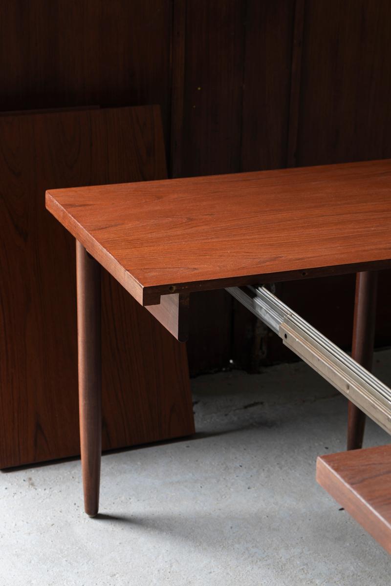 Extendable dining table in teak wood, rectangular design at 1stDibs