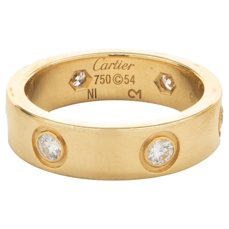 Cartier 18 Karat Yellow Gold Diamond Love Ring, 6 Diamonds at 1stDibs