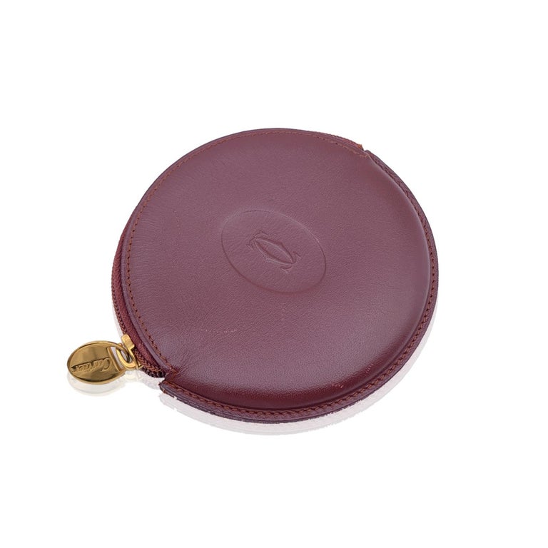 Cartier Burgundy Leather Round Coin Purse Wallet For Sale at 1stDibs