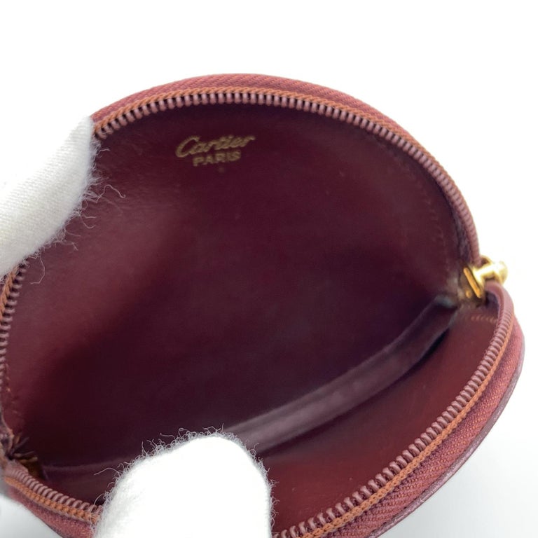 Cartier Burgundy Leather Round Coin Purse Wallet For Sale at 1stDibs