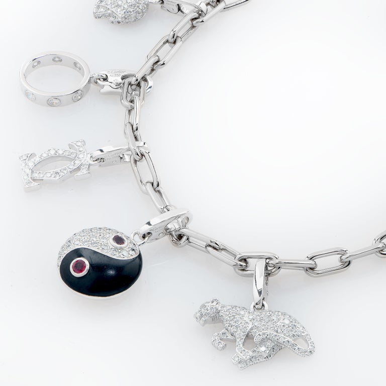 Cartier Charm Bracelet in 18 Karat White Gold With 8 Charms For Sale at ...