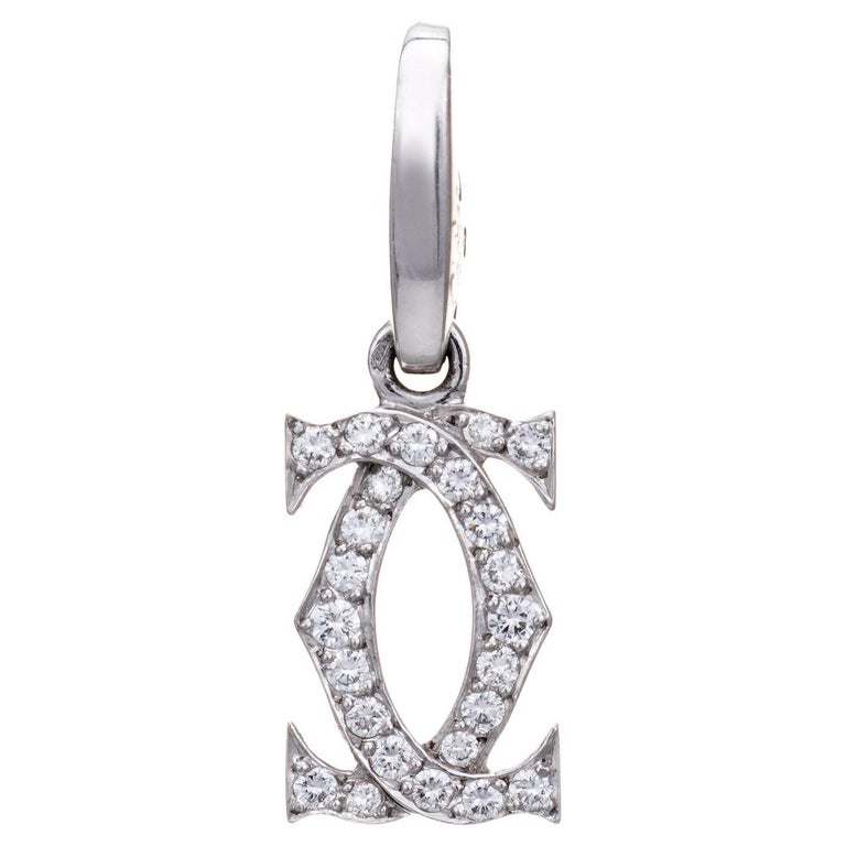 Cartier Pendentif de collection en or blanc 18 carats avec double carat ...