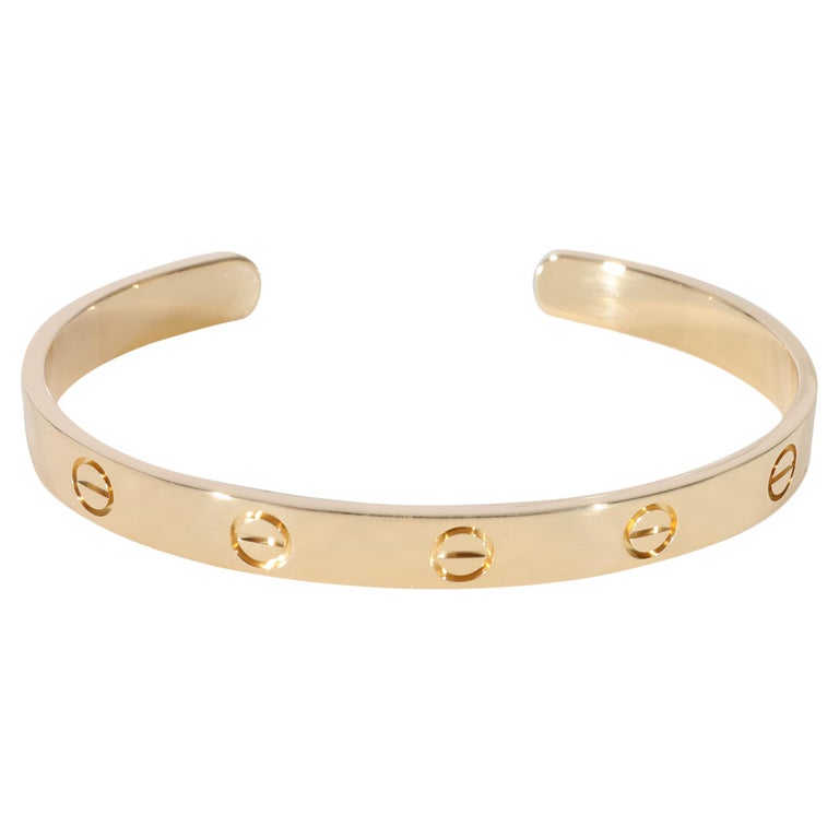 Cartier Bracelet manchette Love en or jaune 18 carats En vente sur 1stDibs