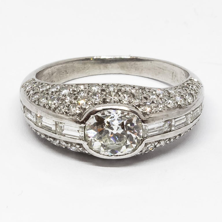 Cartier Oval Cut Diamond Platinum Ring at 1stDibs