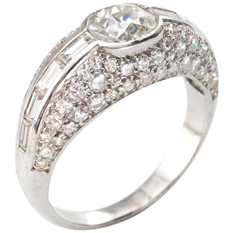 Cartier Oval Cut Diamond Platinum Ring at 1stDibs