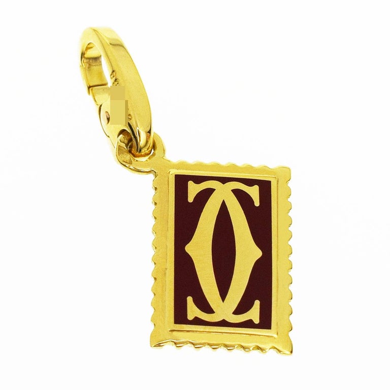 Cartier Red LACQ Stamp 18 Karat Yellow Gold Charm at 1stDibs