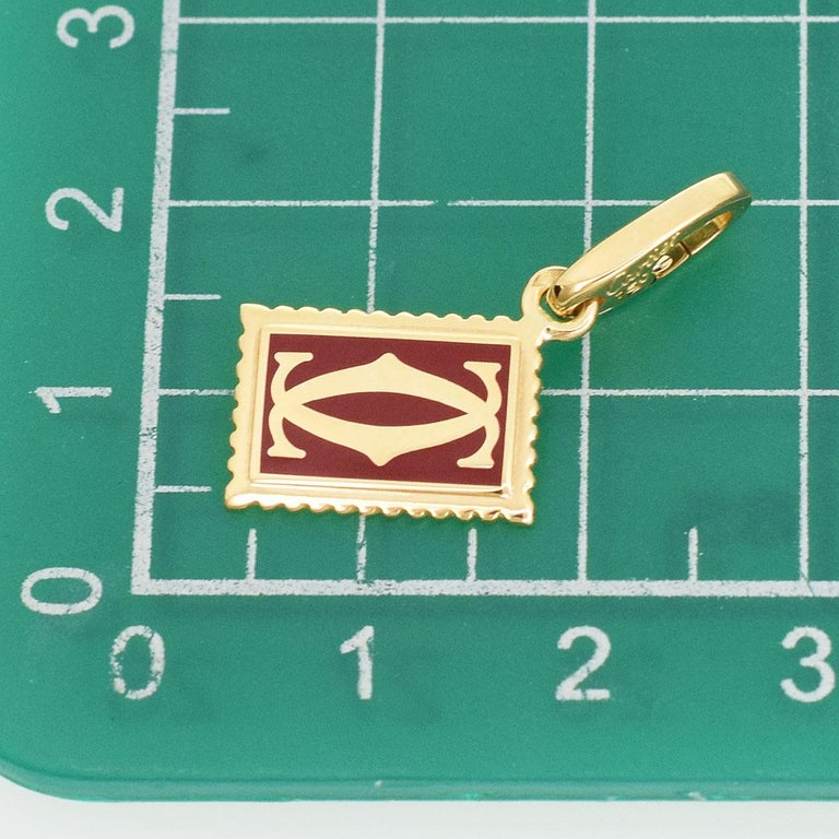 Cartier Red LACQ Stamp 18 Karat Yellow Gold Charm at 1stDibs