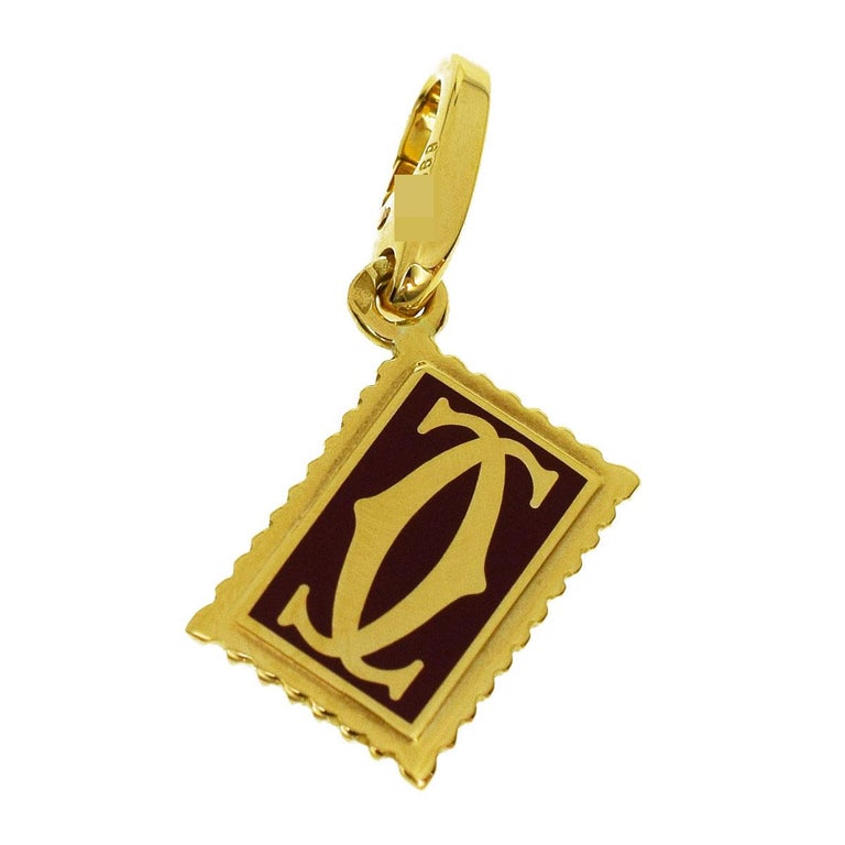 Cartier Red LACQ Stamp 18 Karat Yellow Gold Charm at 1stDibs