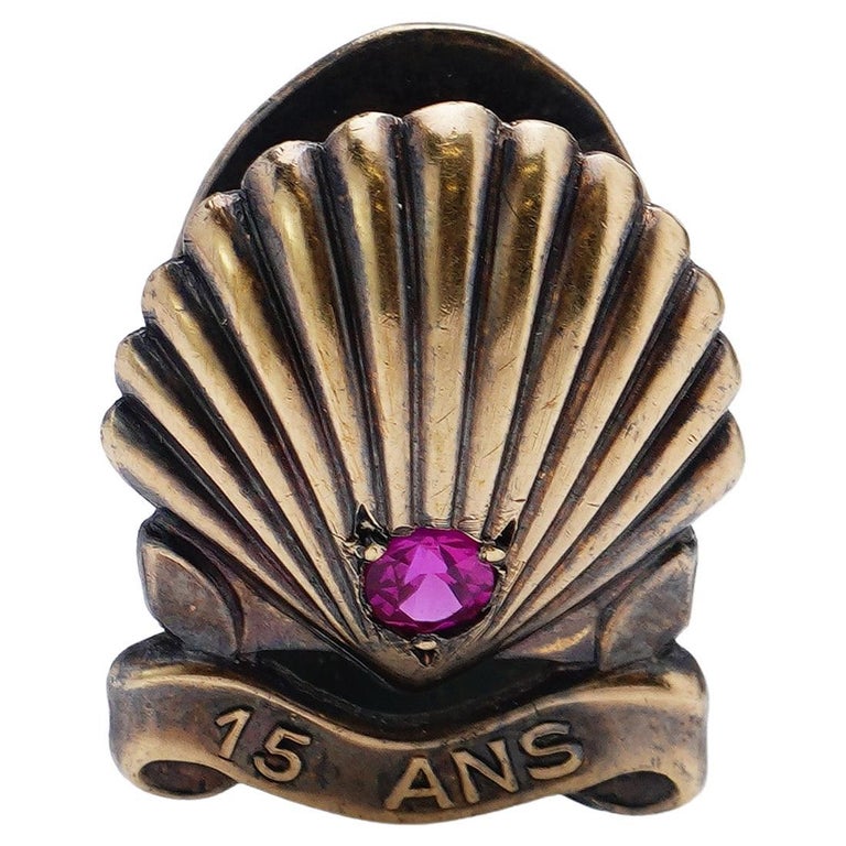 Cartier silver-gilt buttonhole brooch in the shape of a scallop shell ...