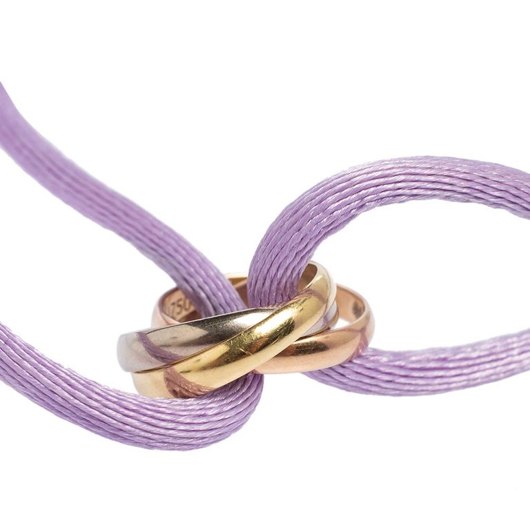 Cartier Trinity 18K Three Tone Gold Adjustable Cord Bracelet at 1stDibs