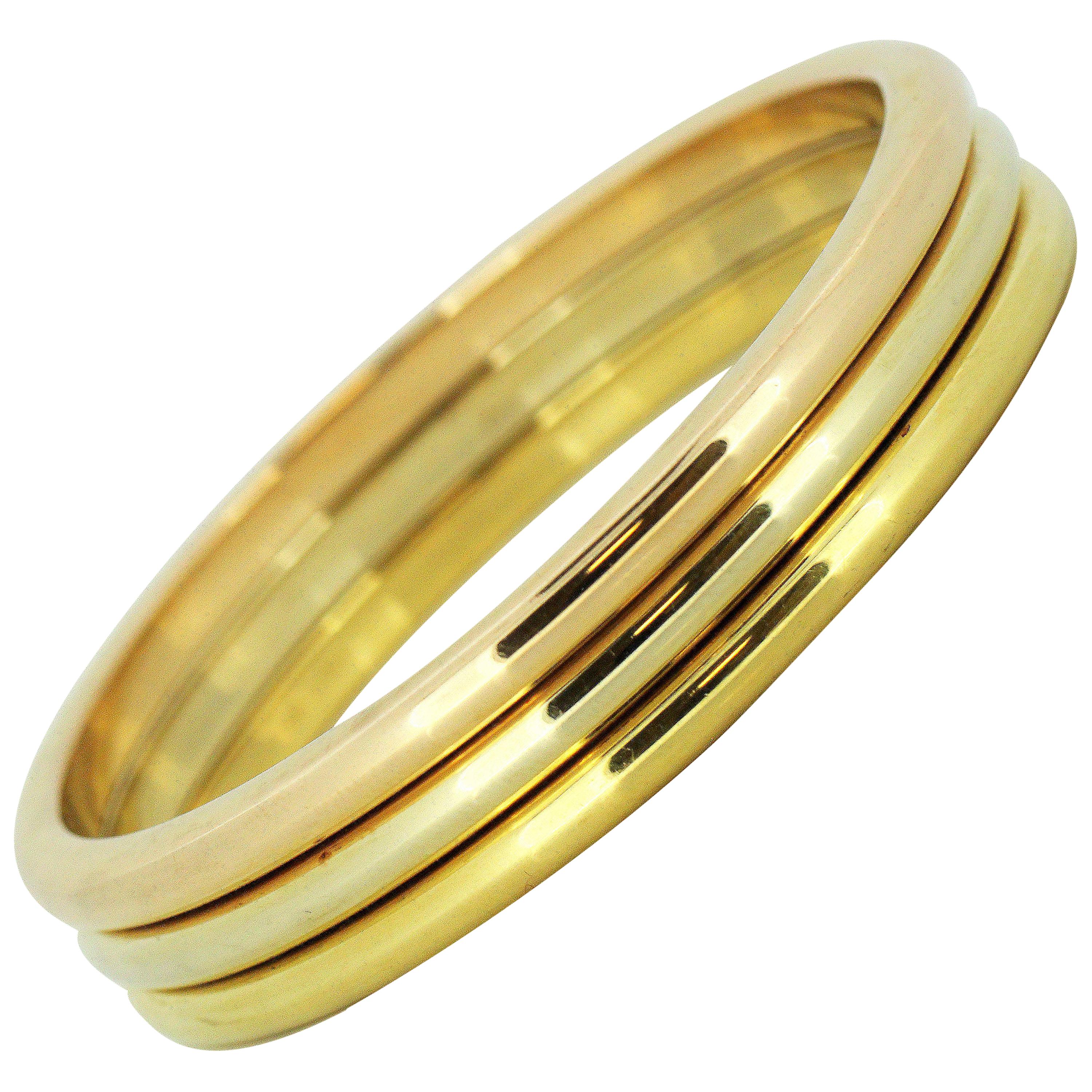 Cartier "Trinity" Bangle in White, Yellow and Rose Gold, France, 1995 ...