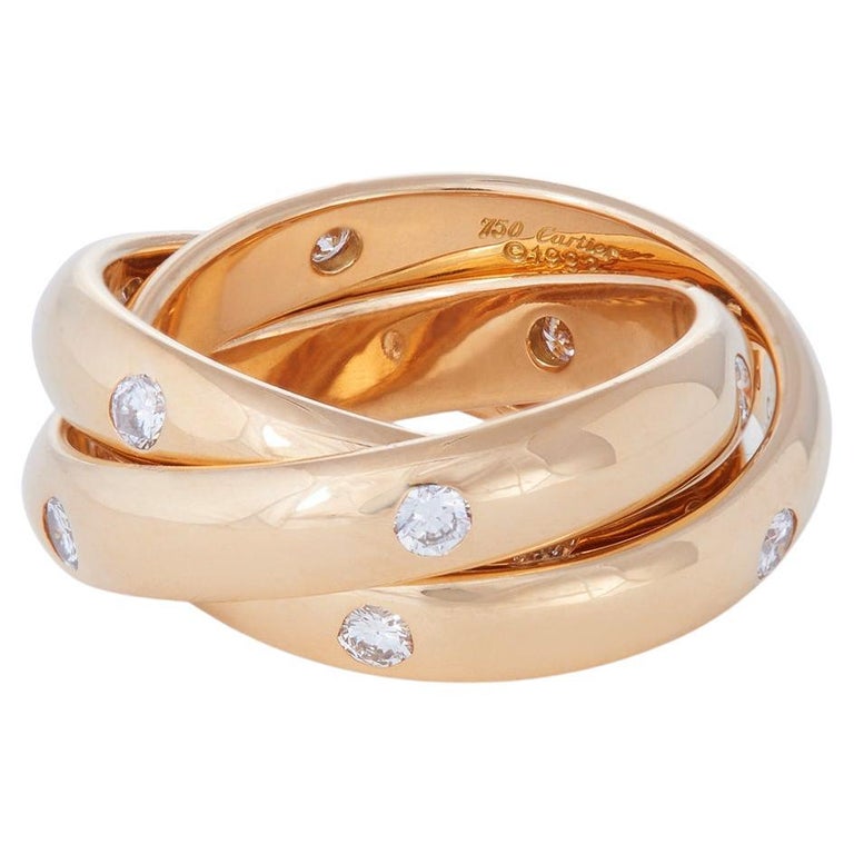 Bague Trinity Constellation de Cartier en or jaune et diamants En vente ...