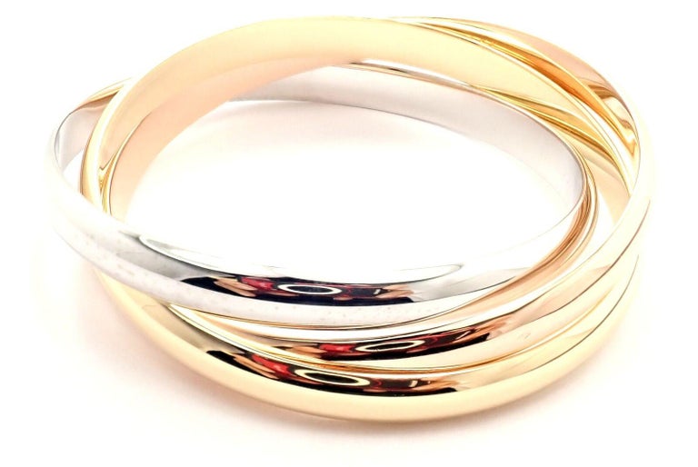 Cartier Trinity Rolling Tricolor Gold Bangle Bracelet For Sale at 1stDibs