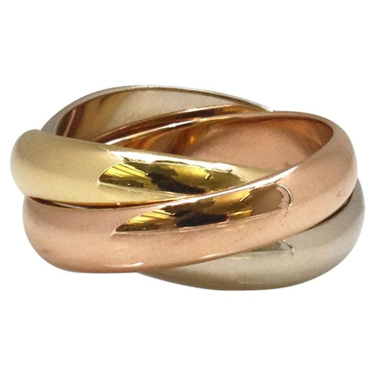 Cartier Trinity Tri-Color Gold Rolling Ring at 1stDibs