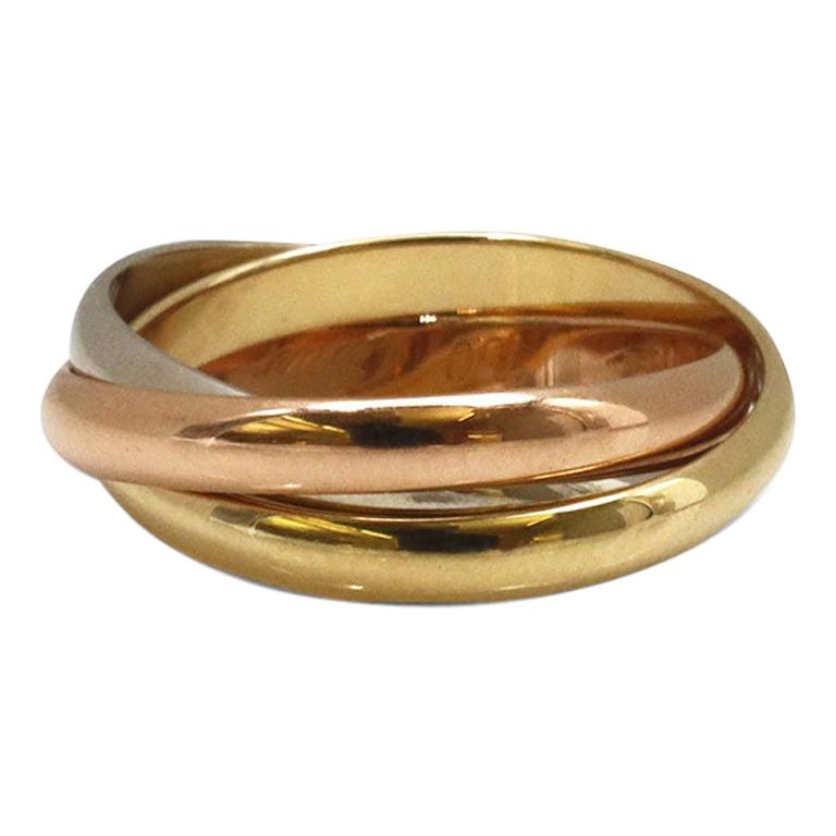 Cartier Trinity Tri-Color Gold Rolling Ring at 1stDibs