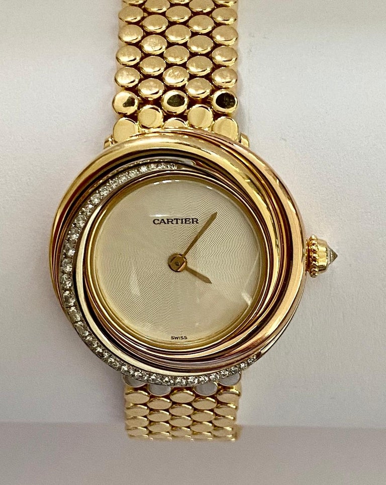 Cartier, Trinity Watch in 18 Karat Gold 33 Diamonds and a 18 Karat Gold ...