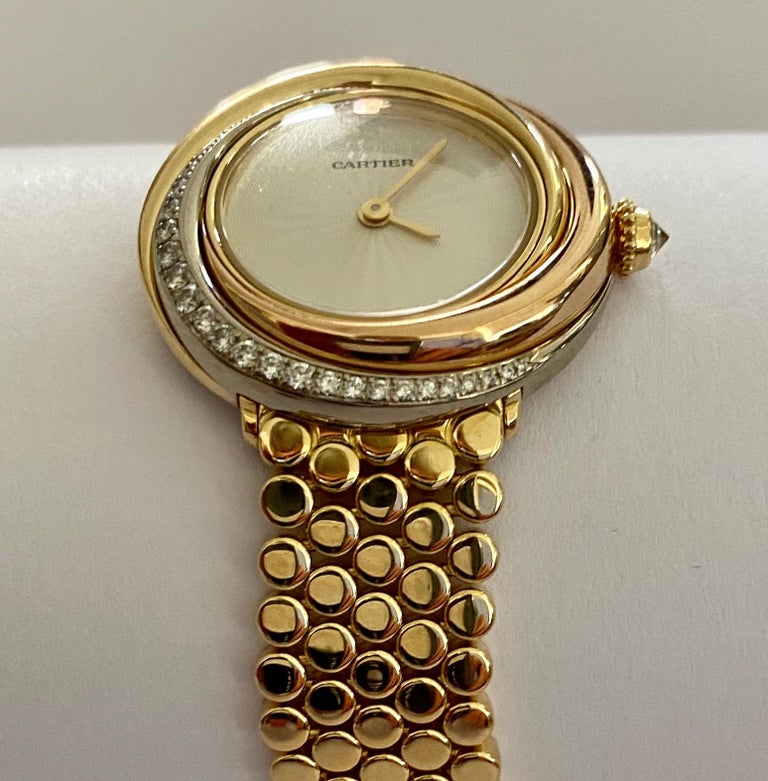 Cartier, Trinity Watch in 18 Karat Gold 33 Diamonds and a 18 Karat Gold ...