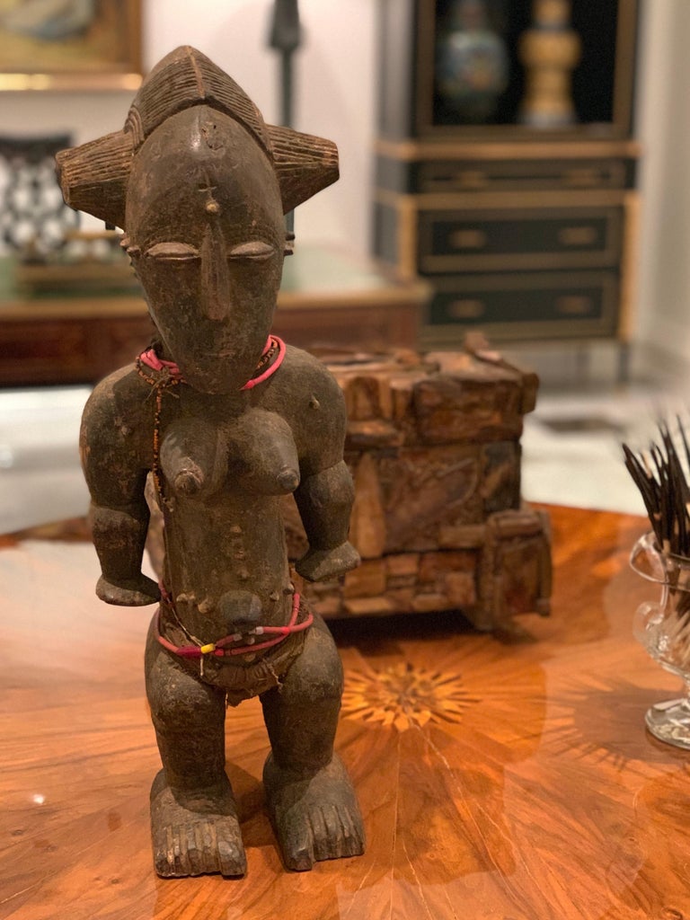 Carved African Baule Style Female Figure Sculpture at 1stDibs