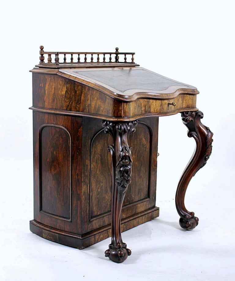 Carved Irish Rosewood and Leather Rise and Fall Davenport, circa 1850 ...